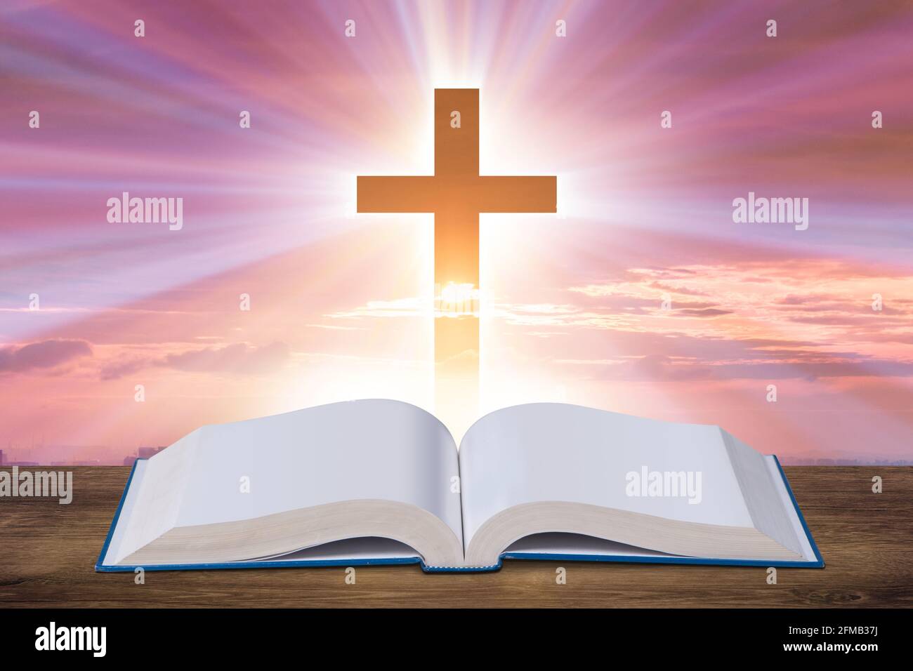 Religious concept with the cross and bible book Stock Photo - Alamy