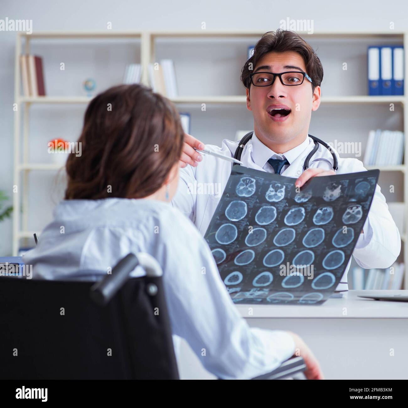 The doctor explaining to patient results of x-ray imaging Stock Photo ...