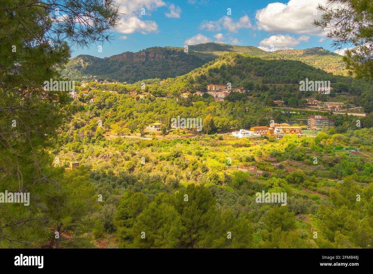 Gorgeous view of sunlight falling on lush tree-covered hills in Serra ...