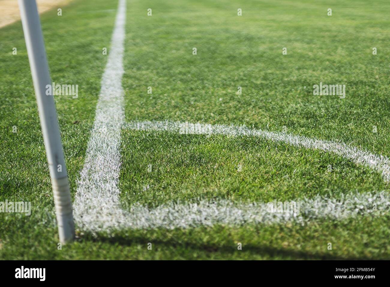 Football field corner flag during the daytime Stock Photo - Alamy