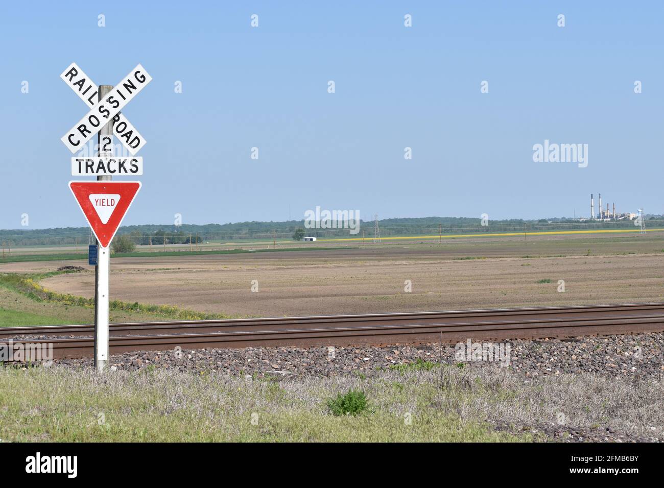 Railroad crossing warning sign in rural United States Stock Photo - Alamy