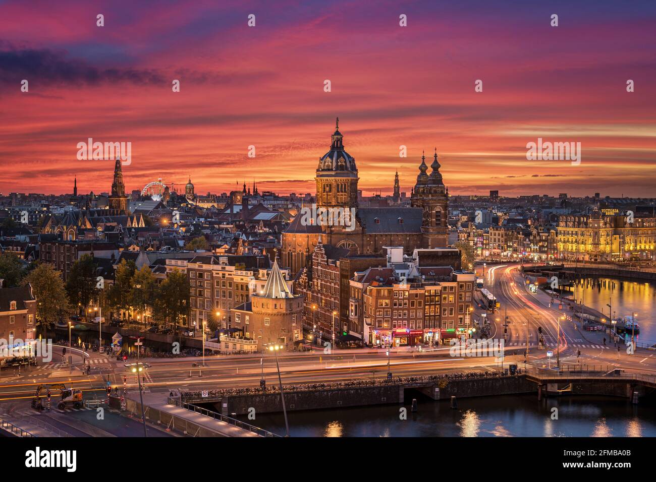 Historic skyline of Amsterdam at night, Netherlands Stock Photo - Alamy