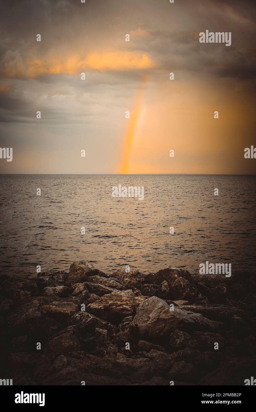 Rainbow over lake Ontario Stock Photo - Alamy