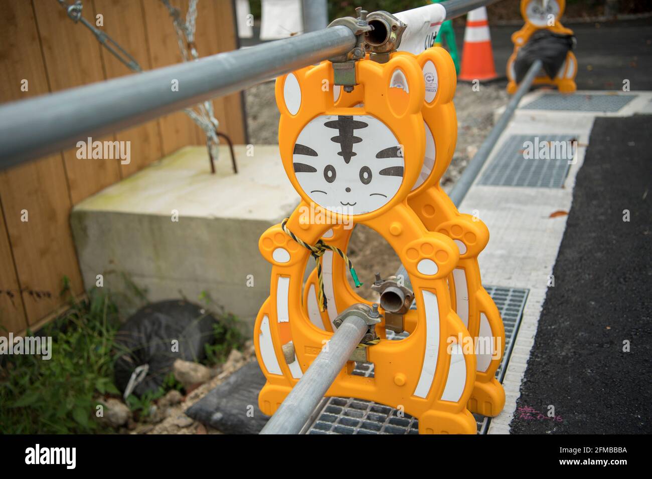 Iron fences or railings are made to look cute in the shape of cats or ...