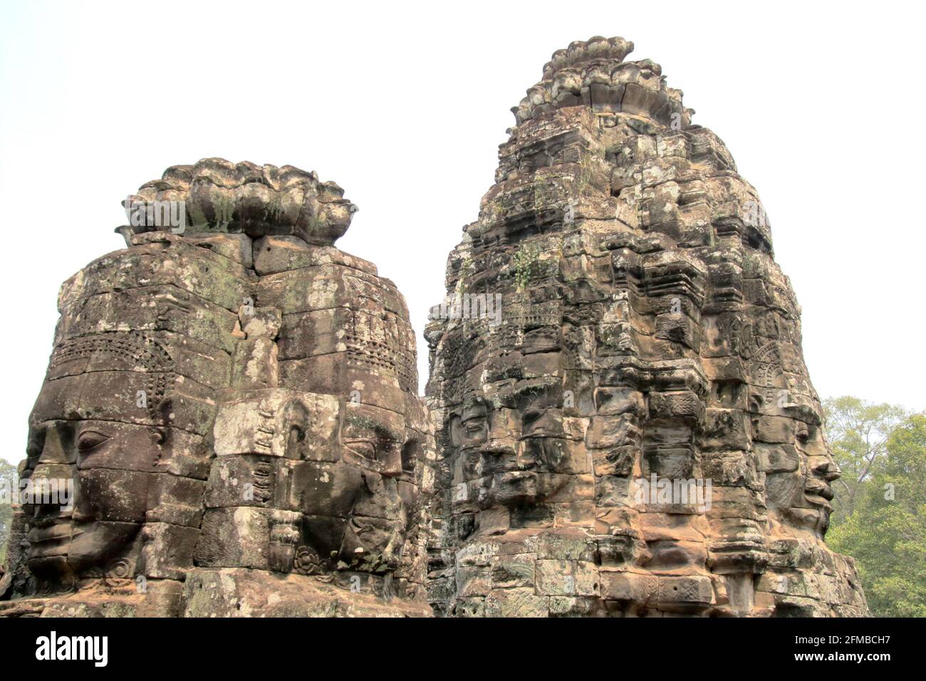 Giant face statue at Angkor Thom Cambodia Stock Photo - Alamy