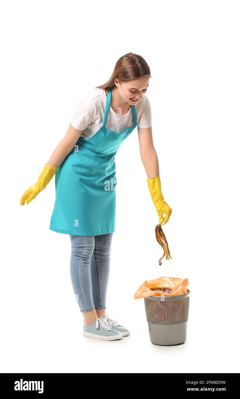 Janitor putting garbage in trash bin on white background Stock Photo ...