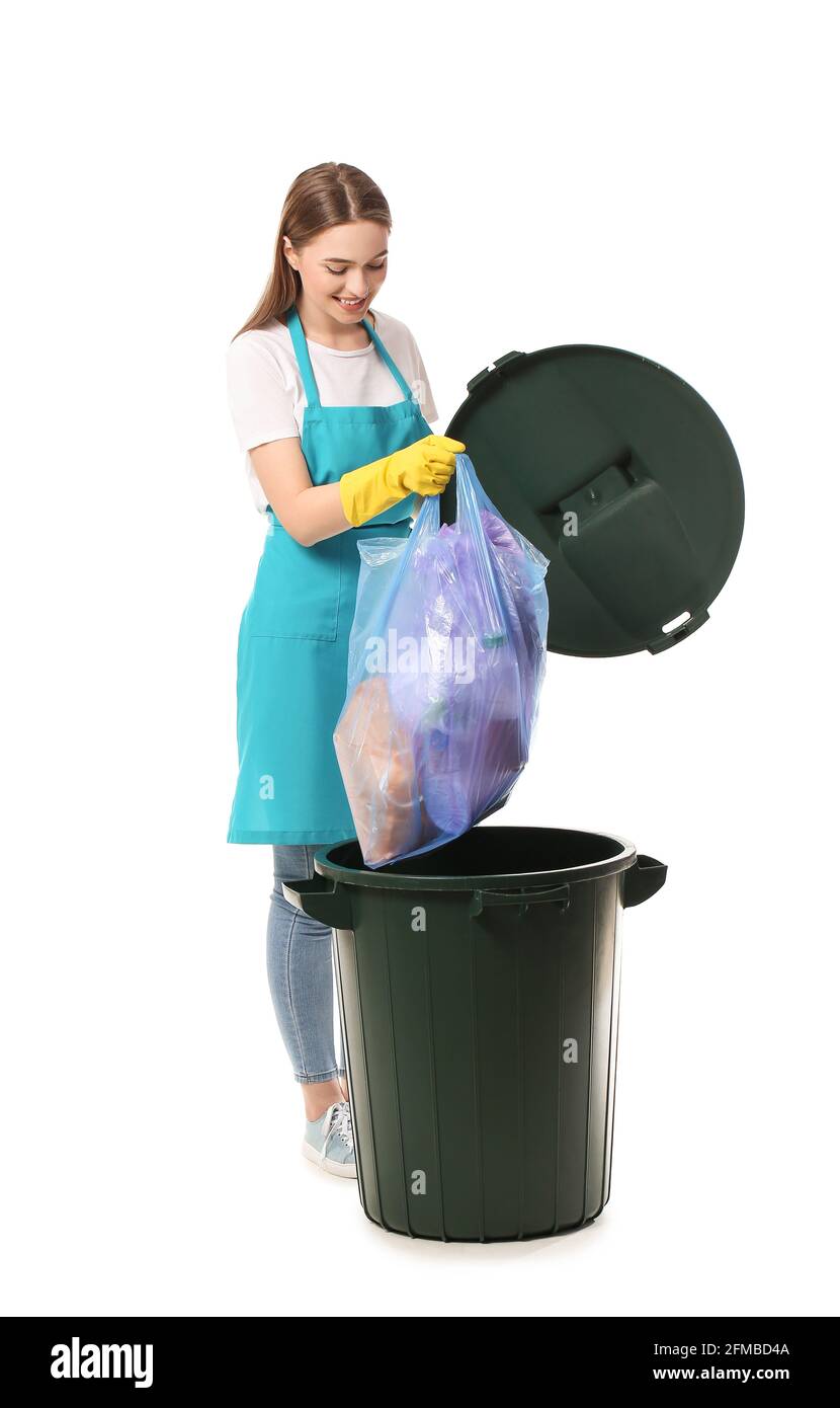Janitor putting garbage in trash bin on white background Stock Photo ...