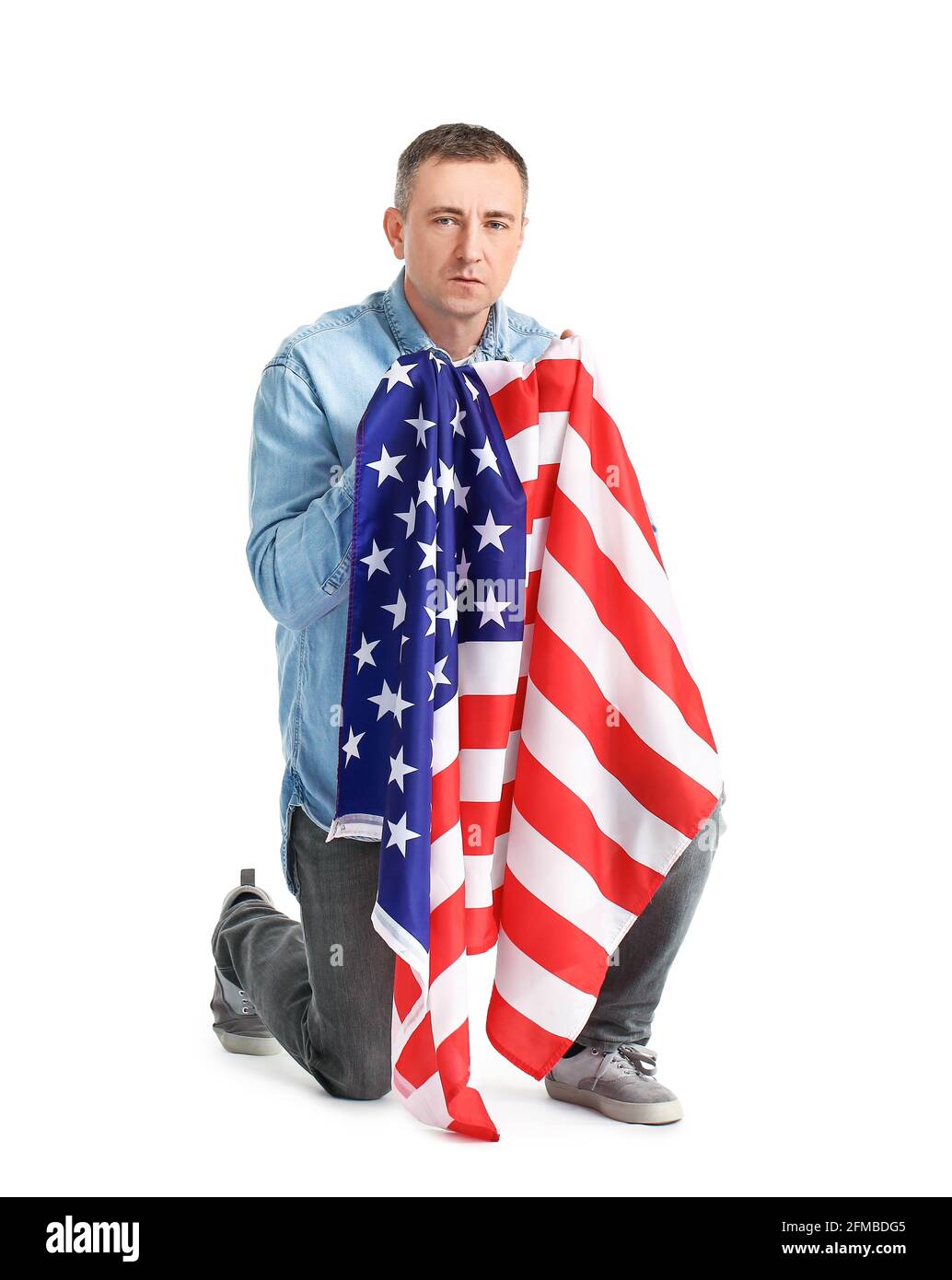 Sad man with USA flag on white background. Memorial Day celebration ...