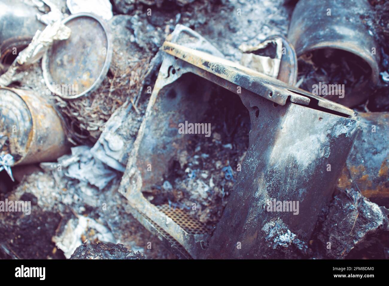 Burnt trash. Remains of burnt garbage. Household waste. Waste disposal ...