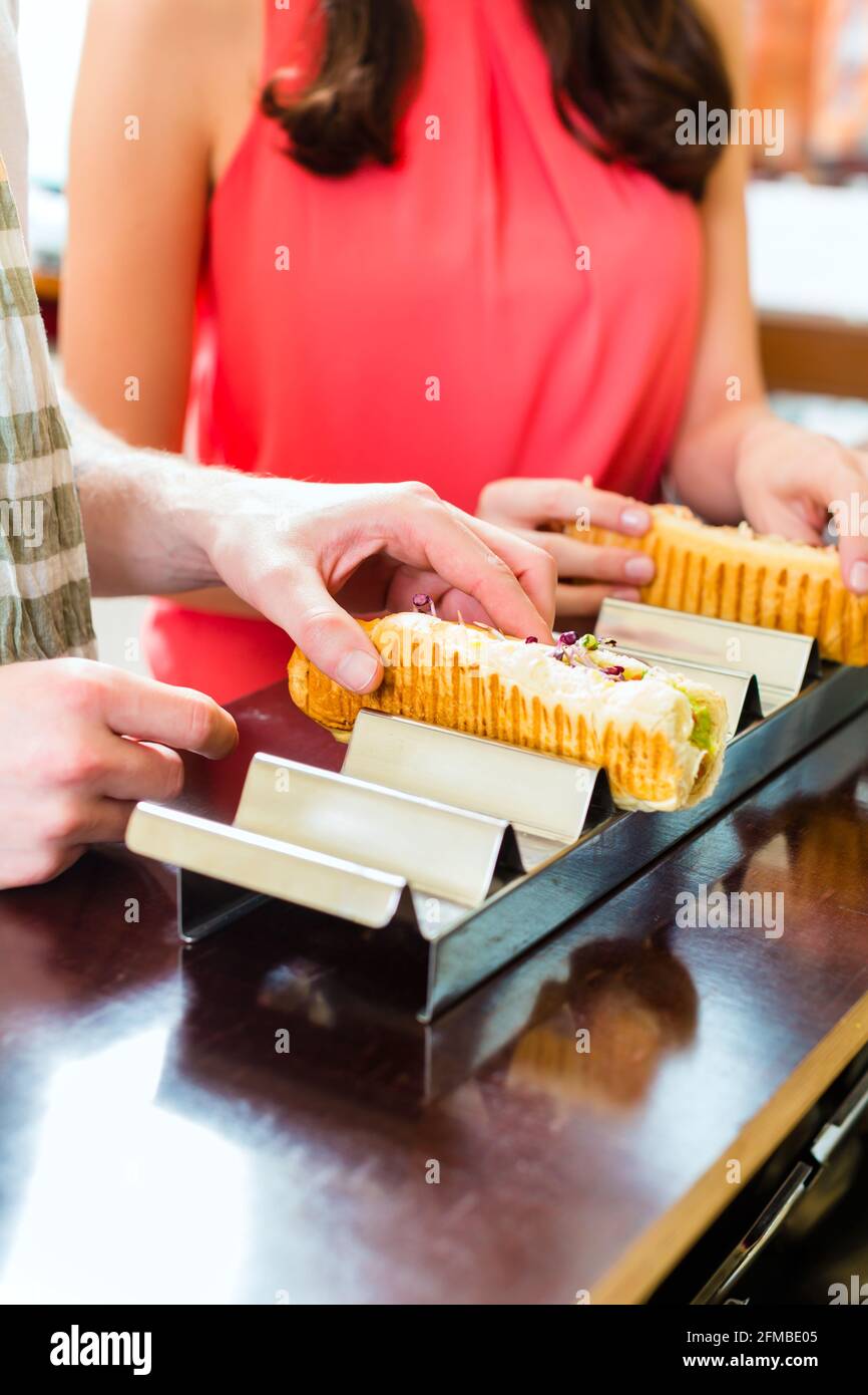 Customers at a concession stand hi-res stock photography and images - Alamy