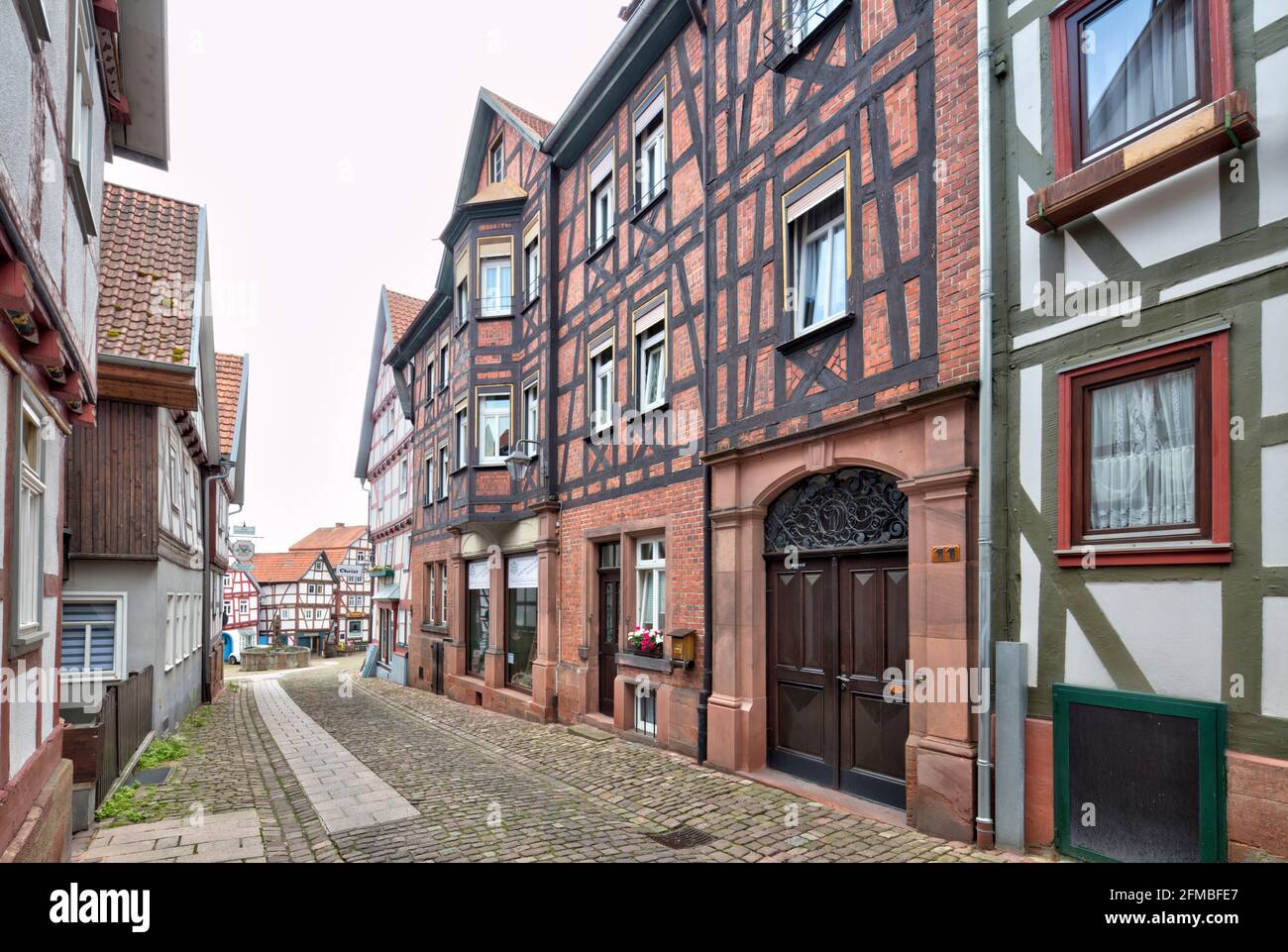 Alley, cobblestone pavement, half-timbered house, front door, entrance ...