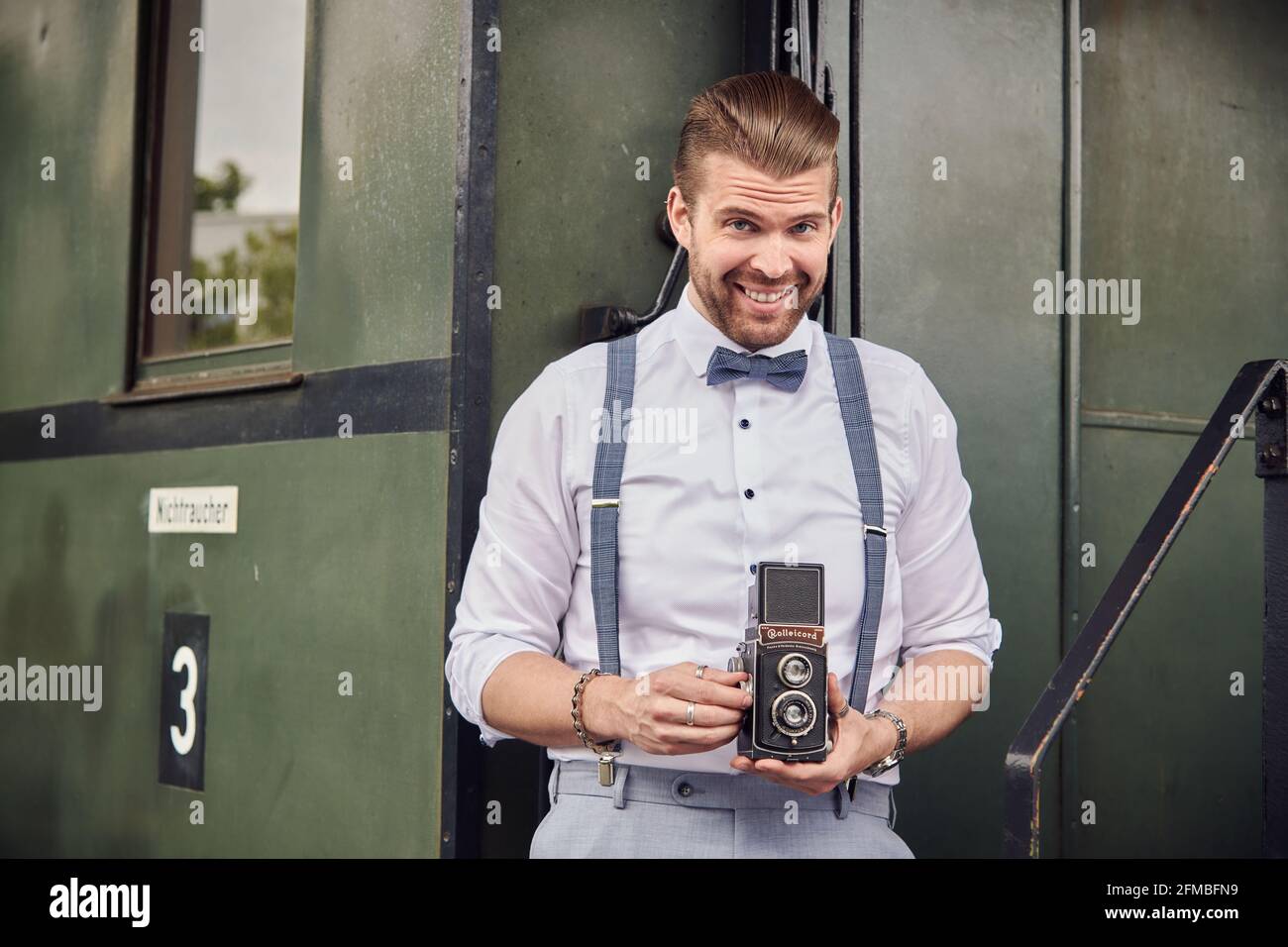 Male model with beard on old train Stock Photo - Alamy