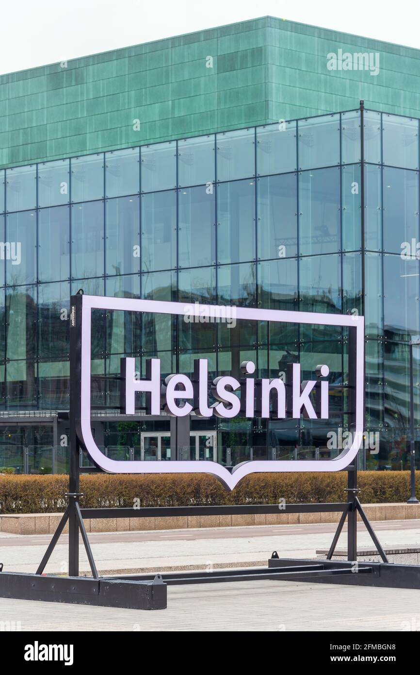 Helsinki sign with light with Helsinki Music centre in the background ...