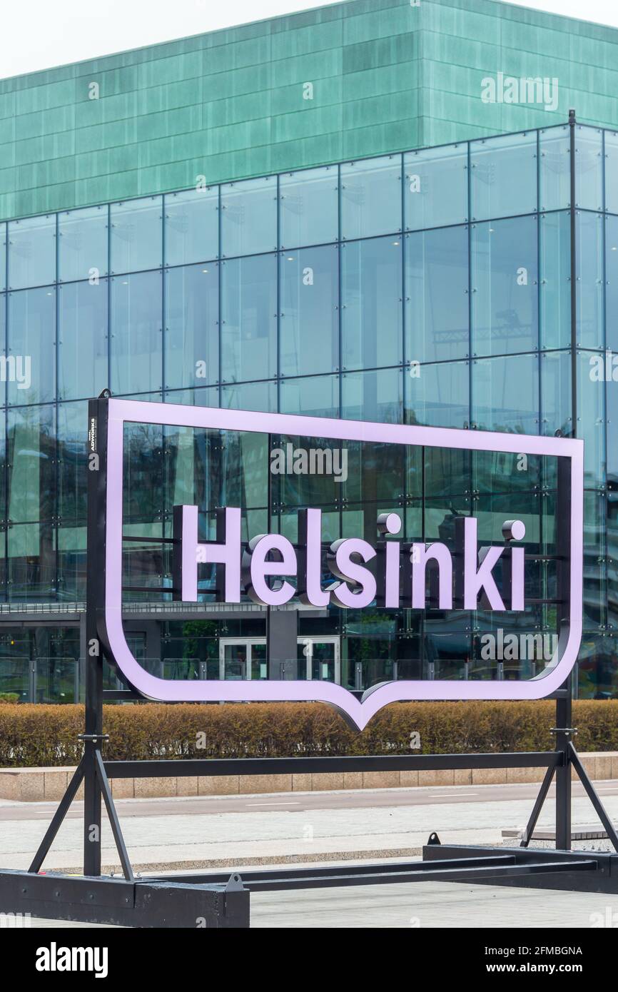 Helsinki sign with light with Helsinki Music centre in the background ...