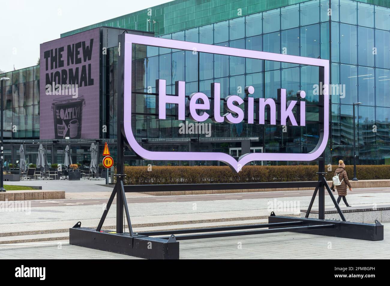 Helsinki sign with light with Helsinki Music centre in the background ...