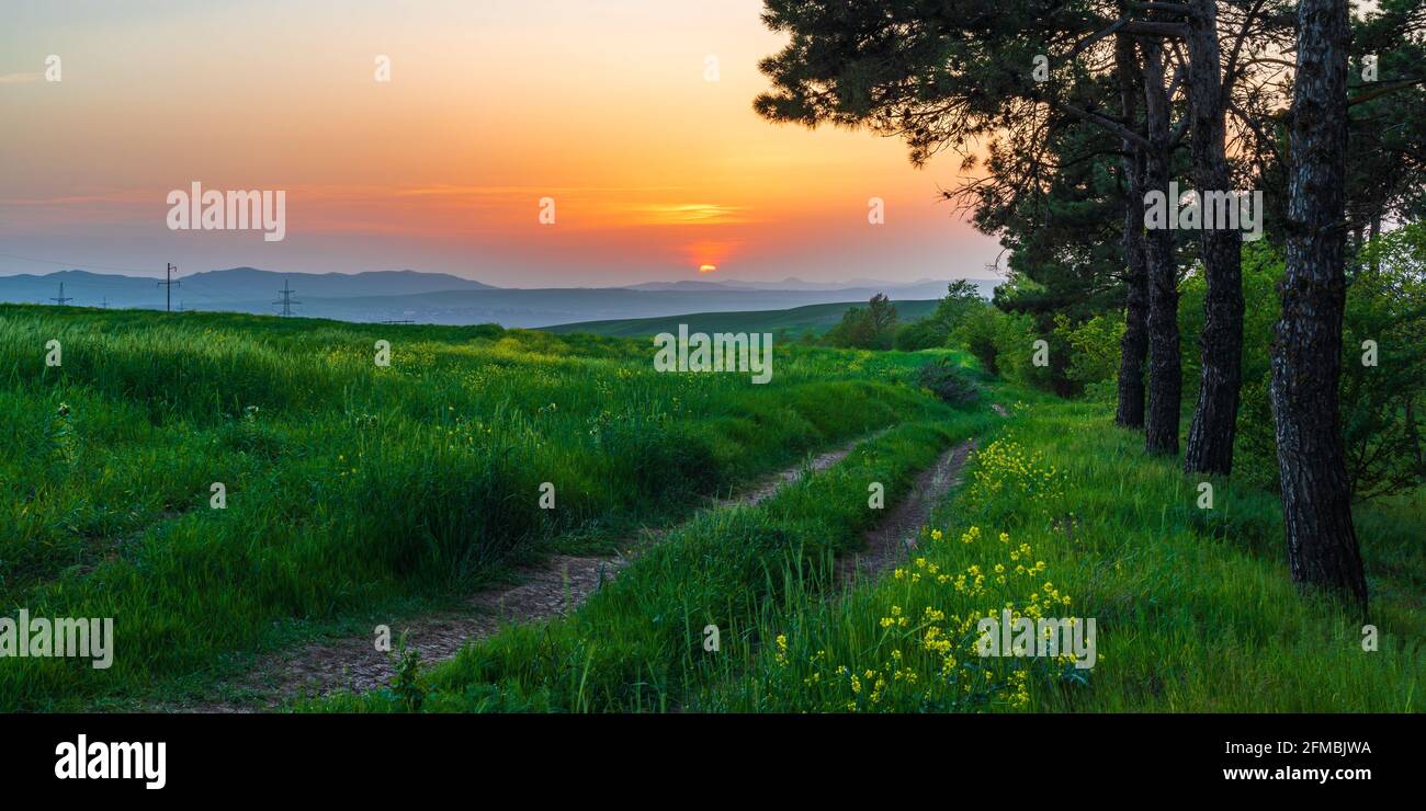 Sunrise over green fields wallpaper hi-res stock photography and images ...