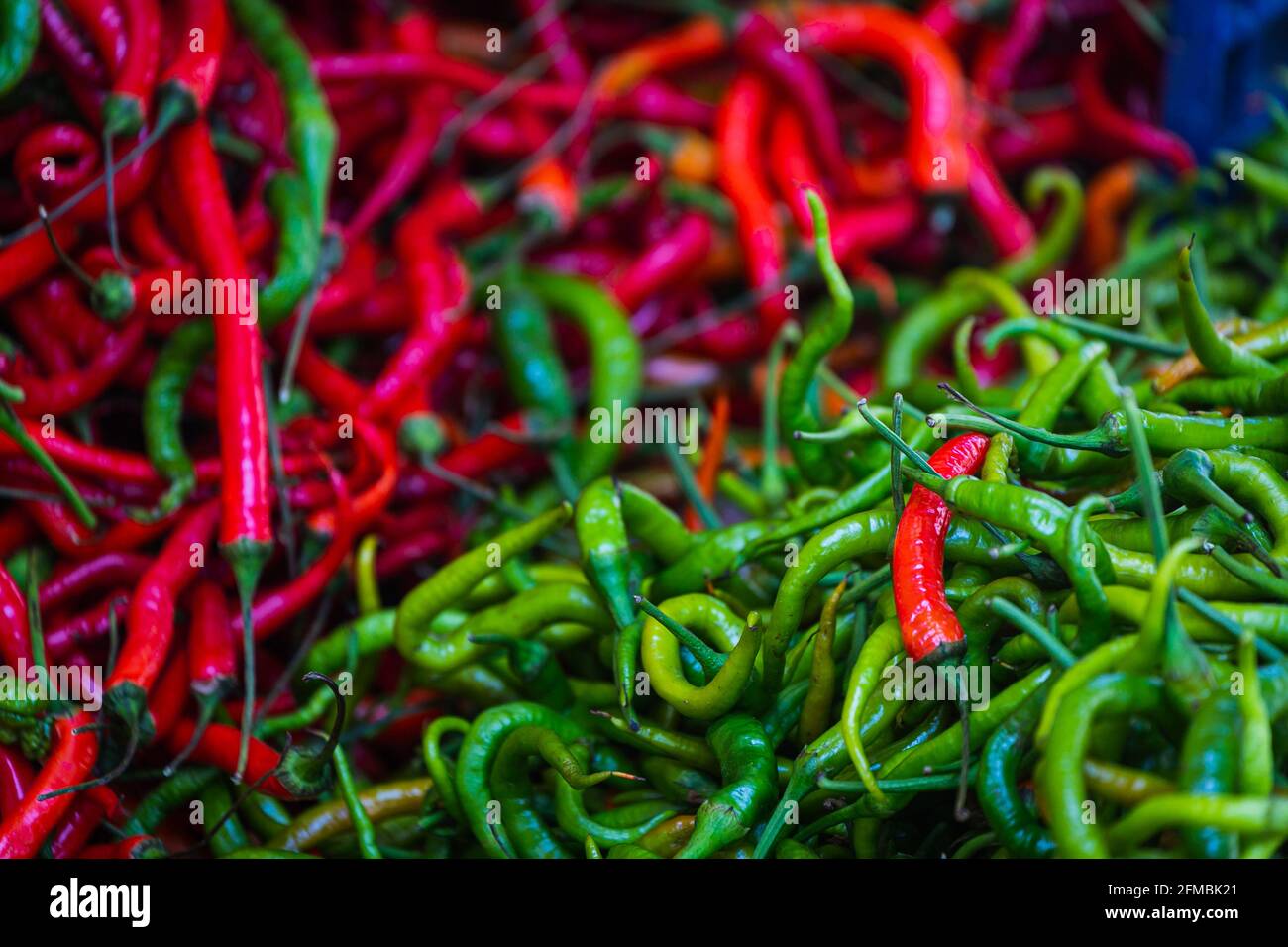 Close-up vegetable for background, green and red pepper texture. Chili ...