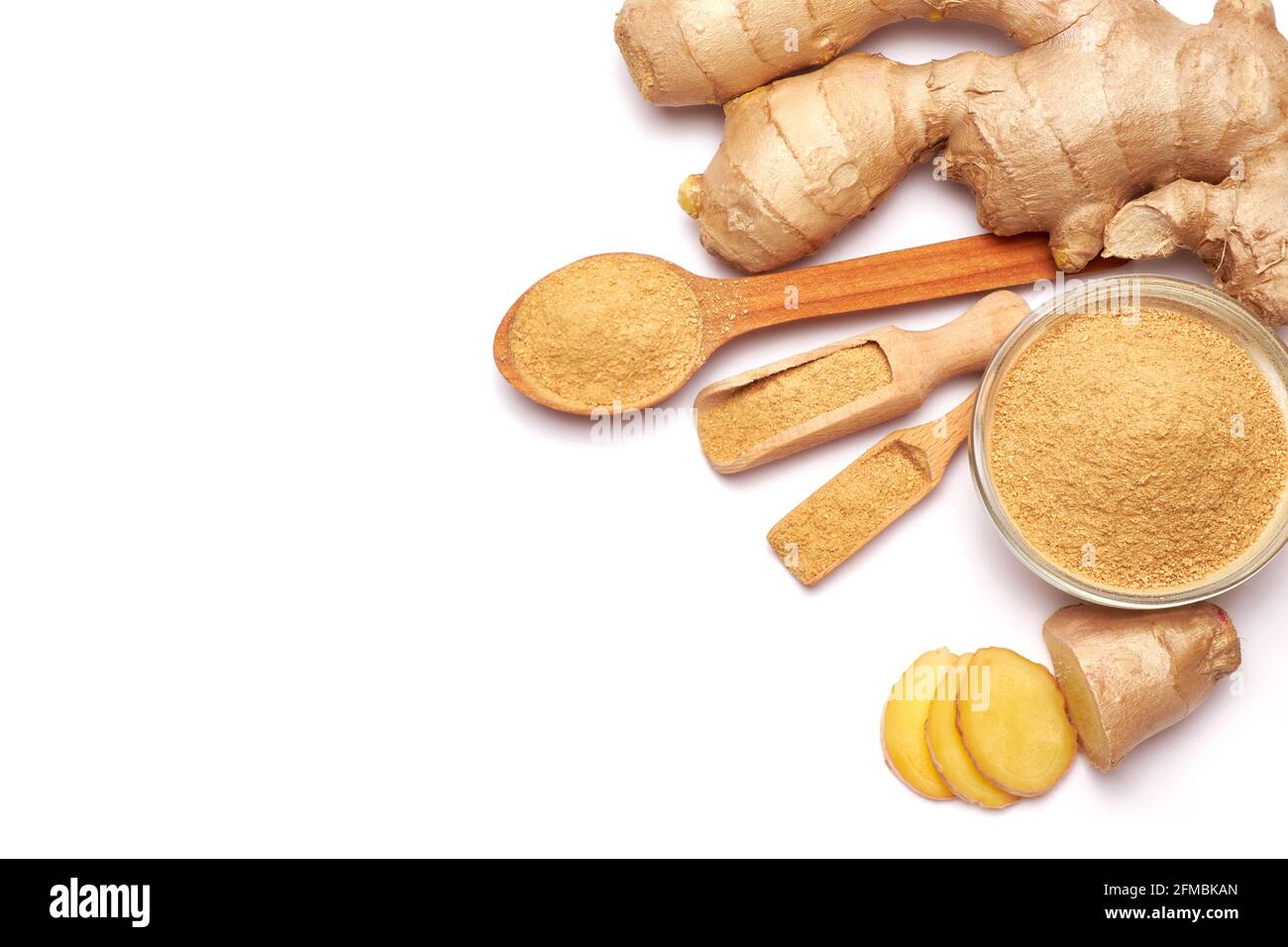 Fresh organic ginger and bowl of grinded spice isolated on white ...