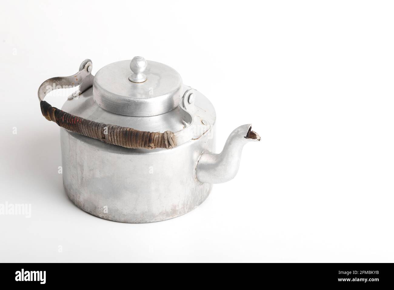 Aluminum tea kettle or tea pot on white background Stock Photo - Alamy
