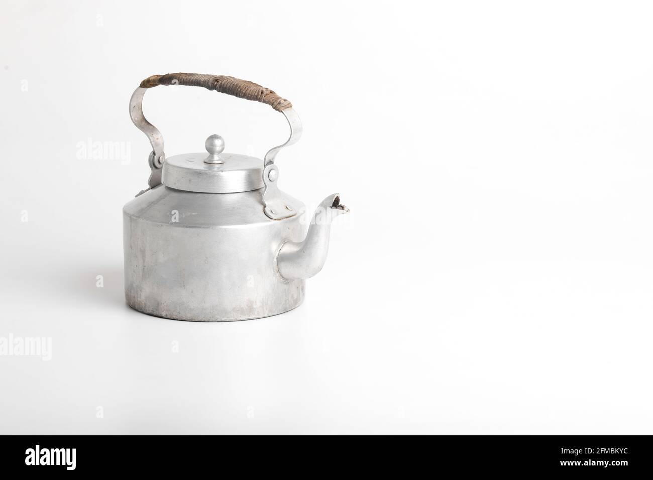Aluminum tea kettle or tea pot on white background Stock Photo - Alamy