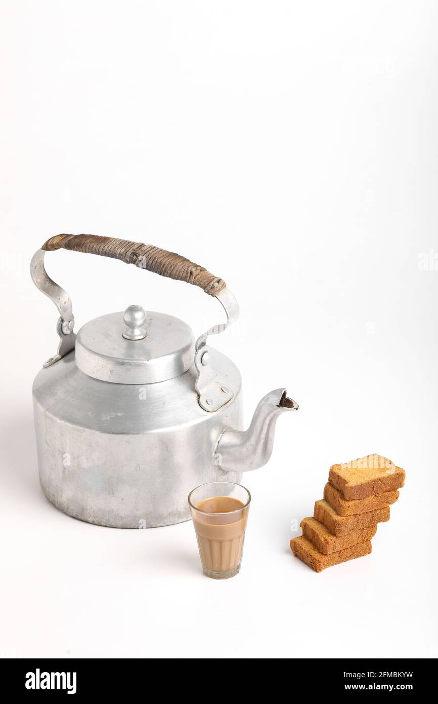 aluminum tea pot or kettle with rusk on white background Stock Photo ...