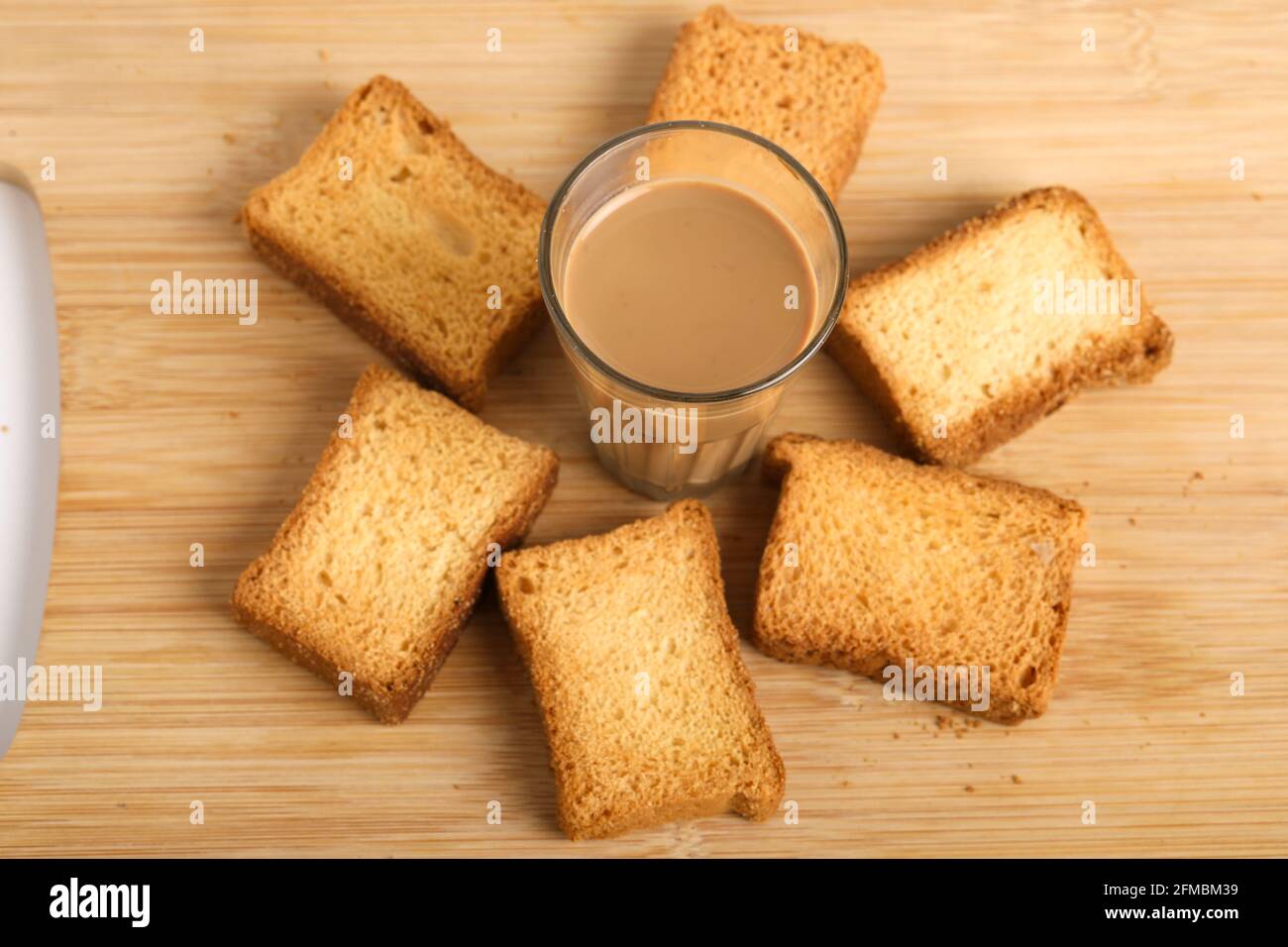 rusk with cup of tea with wood background Stock Photo - Alamy