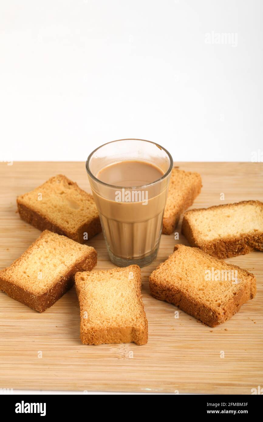 rusk with cup of tea with wood background Stock Photo - Alamy