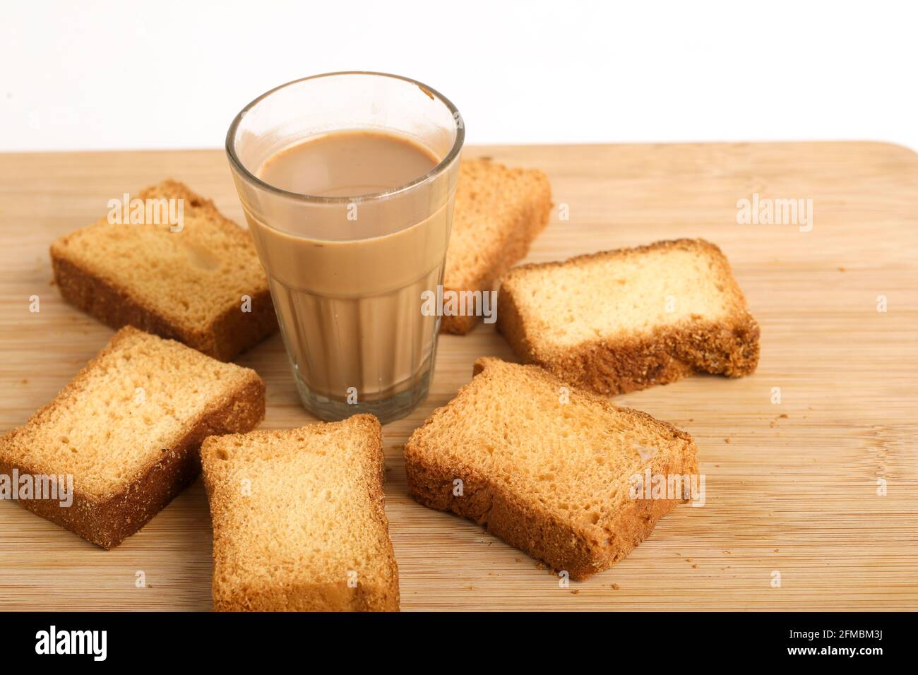 rusk with cup of tea with wood background Stock Photo - Alamy