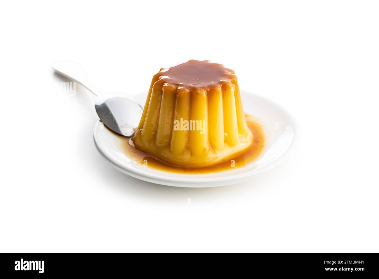 Sweet vanilla pudding. Sweet dessert with caramel topping isolated on ...