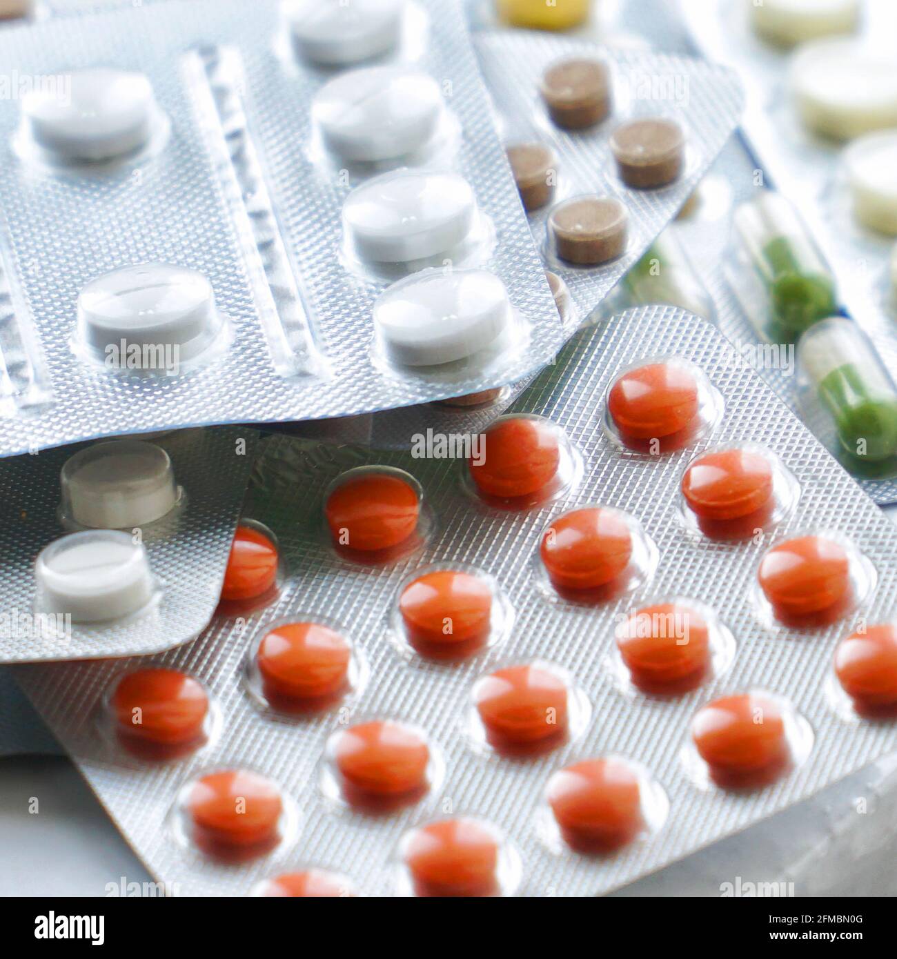 Overall view of pharmaceutical tablets and capsules in packages in ...