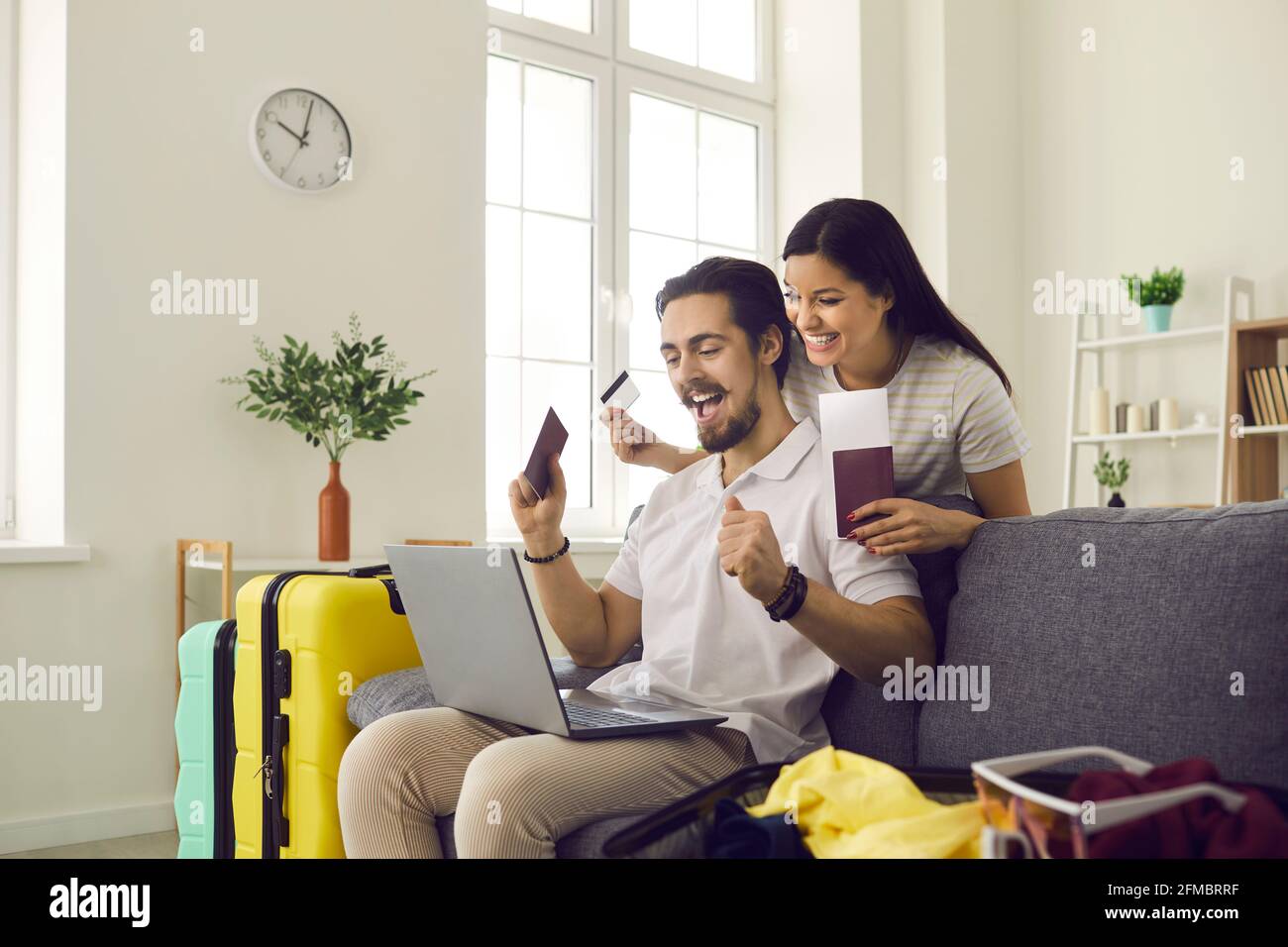 Couple excited laptop hi-res stock photography and images - Alamy