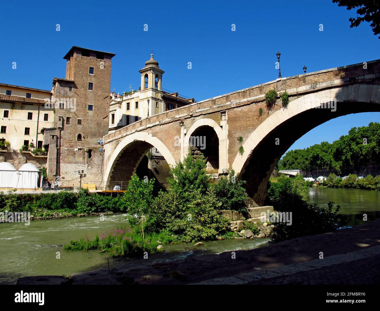 The bridge through Tiber in Trastevere, Rome, Italy Stock Photo - Alamy