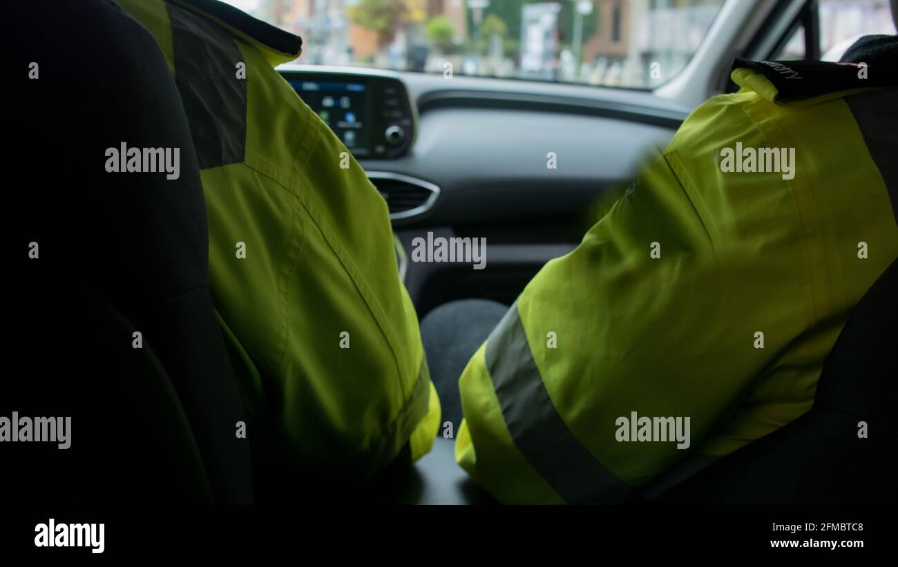 Security guard in a patrol car with a seat belt is on standing by Stock ...