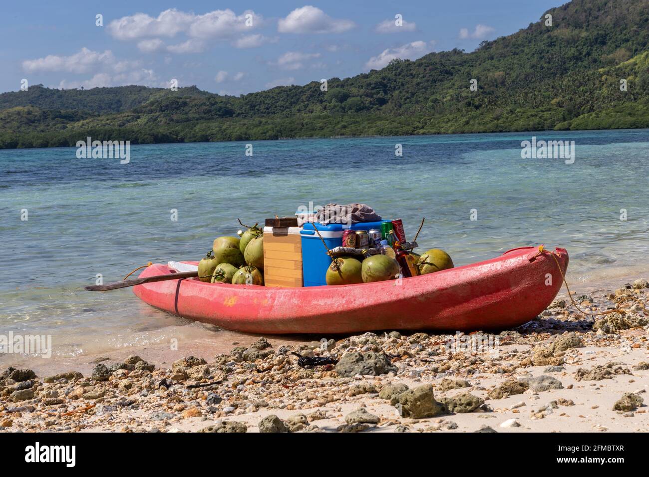 Canoe transporting goods, Snake Island, aka Vigan Island, showing sand ...
