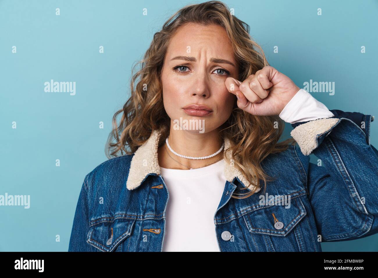 Crying woman looking at camera hi-res stock photography and images - Alamy