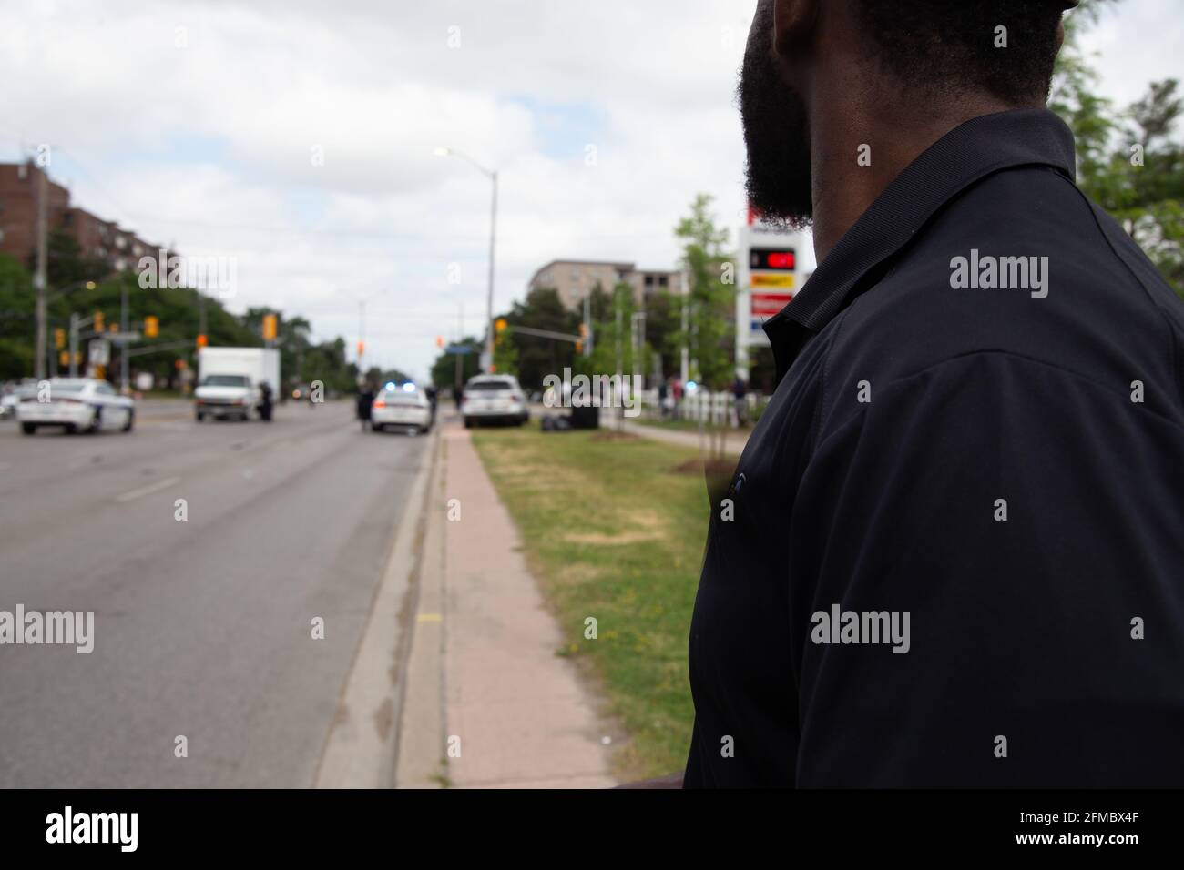Black security guard hi-res stock photography and images - Alamy
