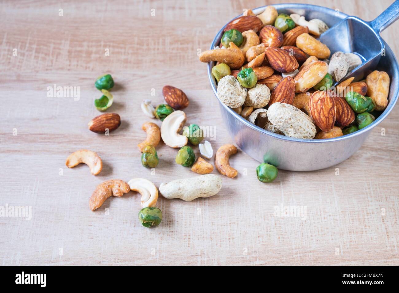 Mixed nuts in the plate hi-res stock photography and images - Alamy