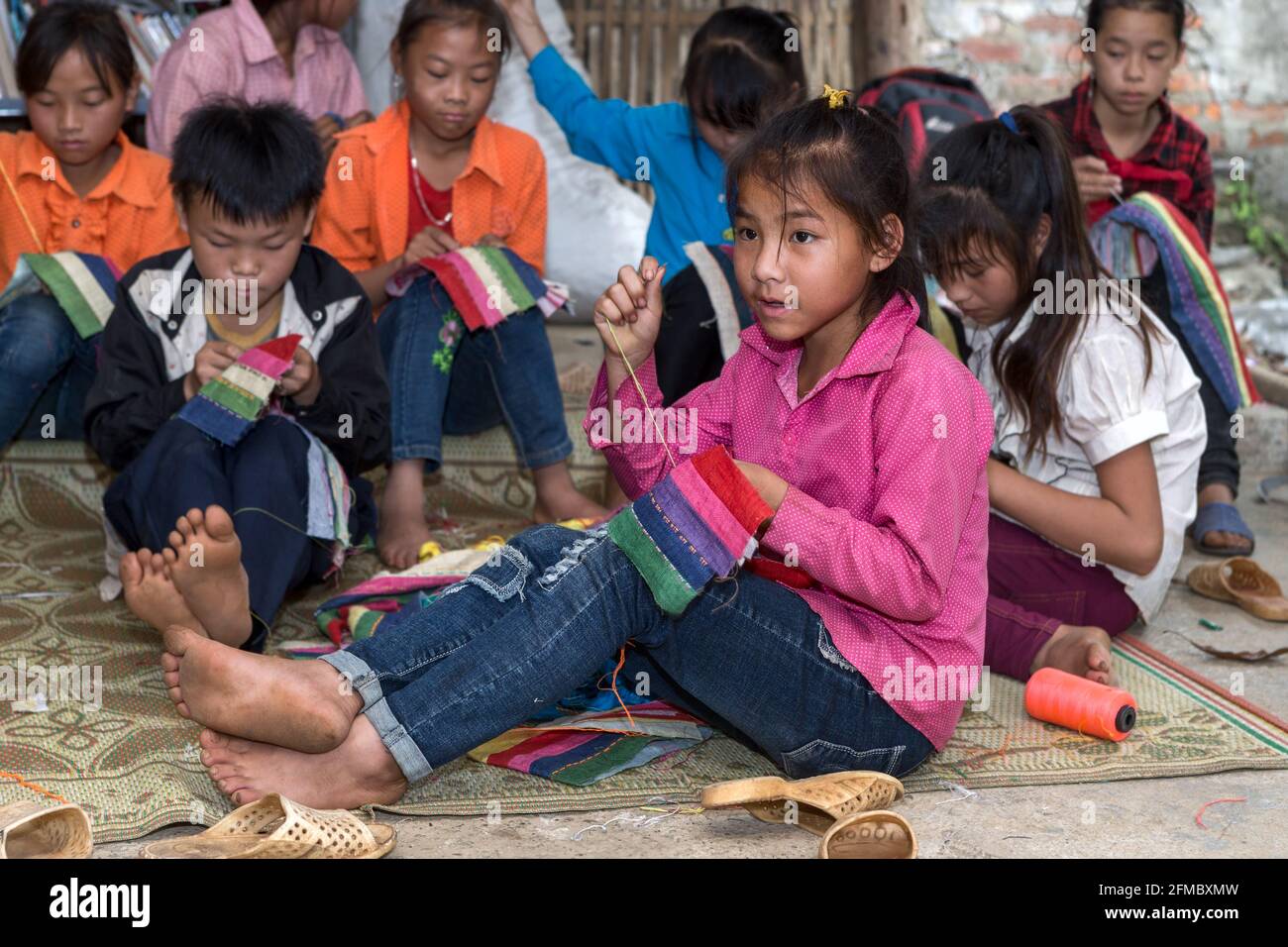 Children embroidering, Lung Tam Linen (flax) co-operative, Ha Giang ...