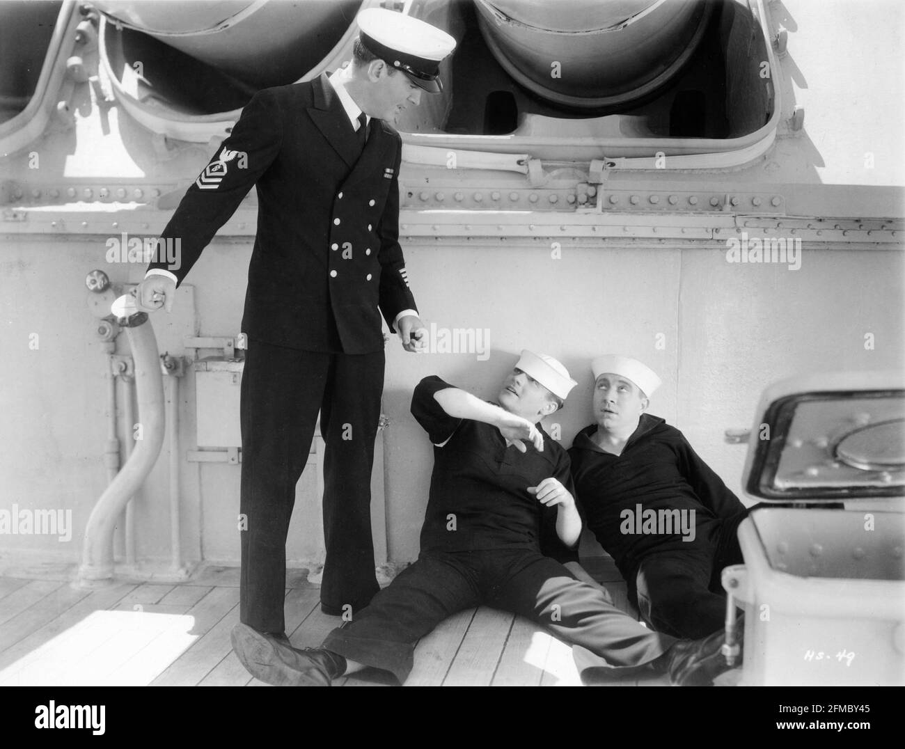 PAT O'BRIEN JAMES CAGNEY and FRANK McHUGH on deck of U.S.S. ARIZONA in ...