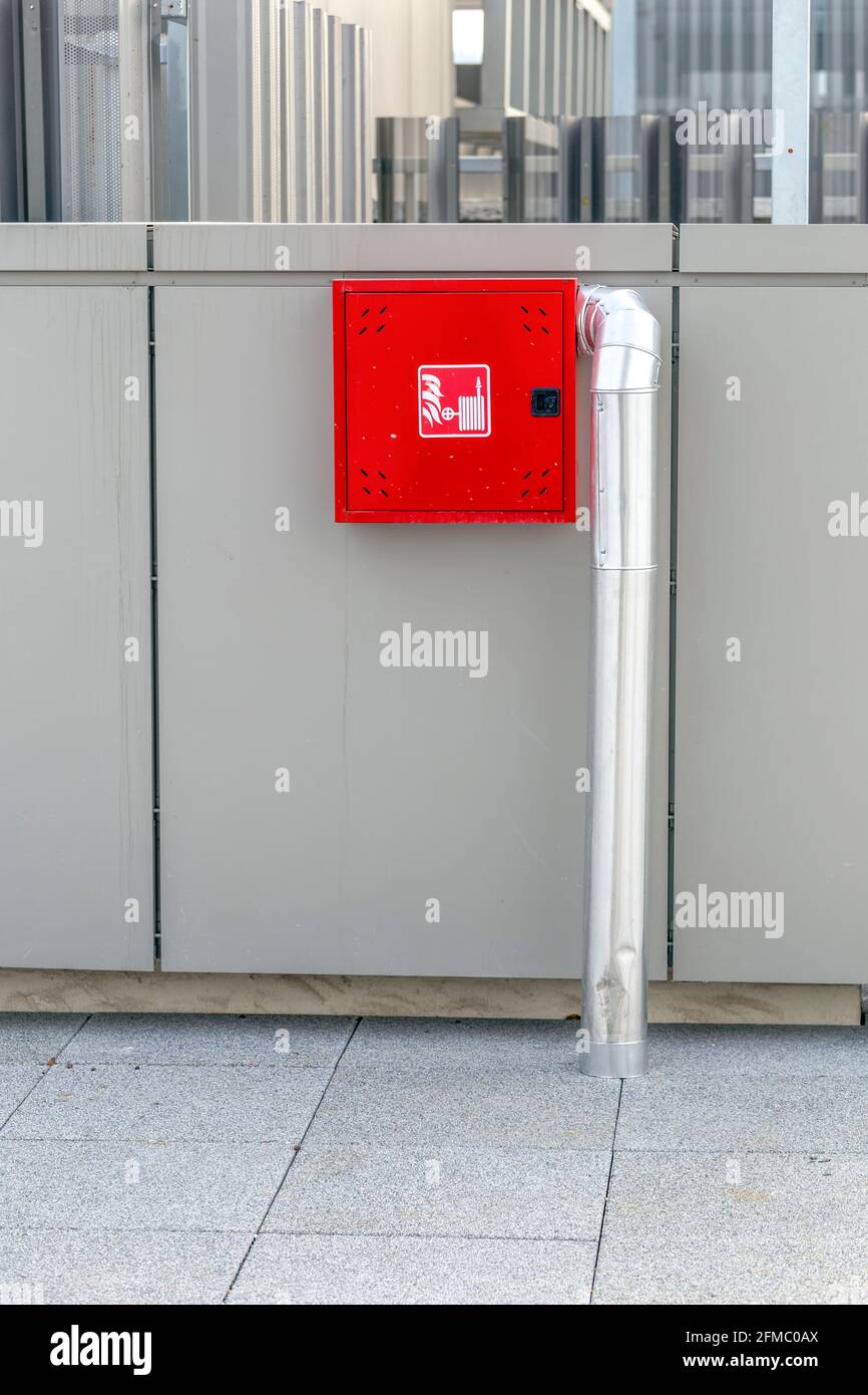 Fire extinguisher box in the public building area Stock Photo - Alamy