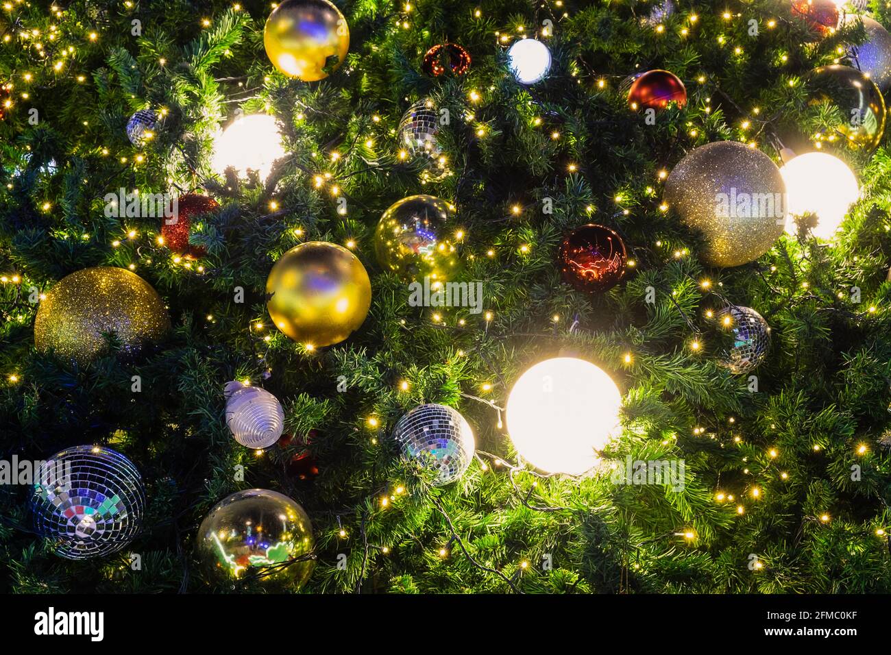 Christmas tree background Decorated with beautiful lights Stock Photo ...