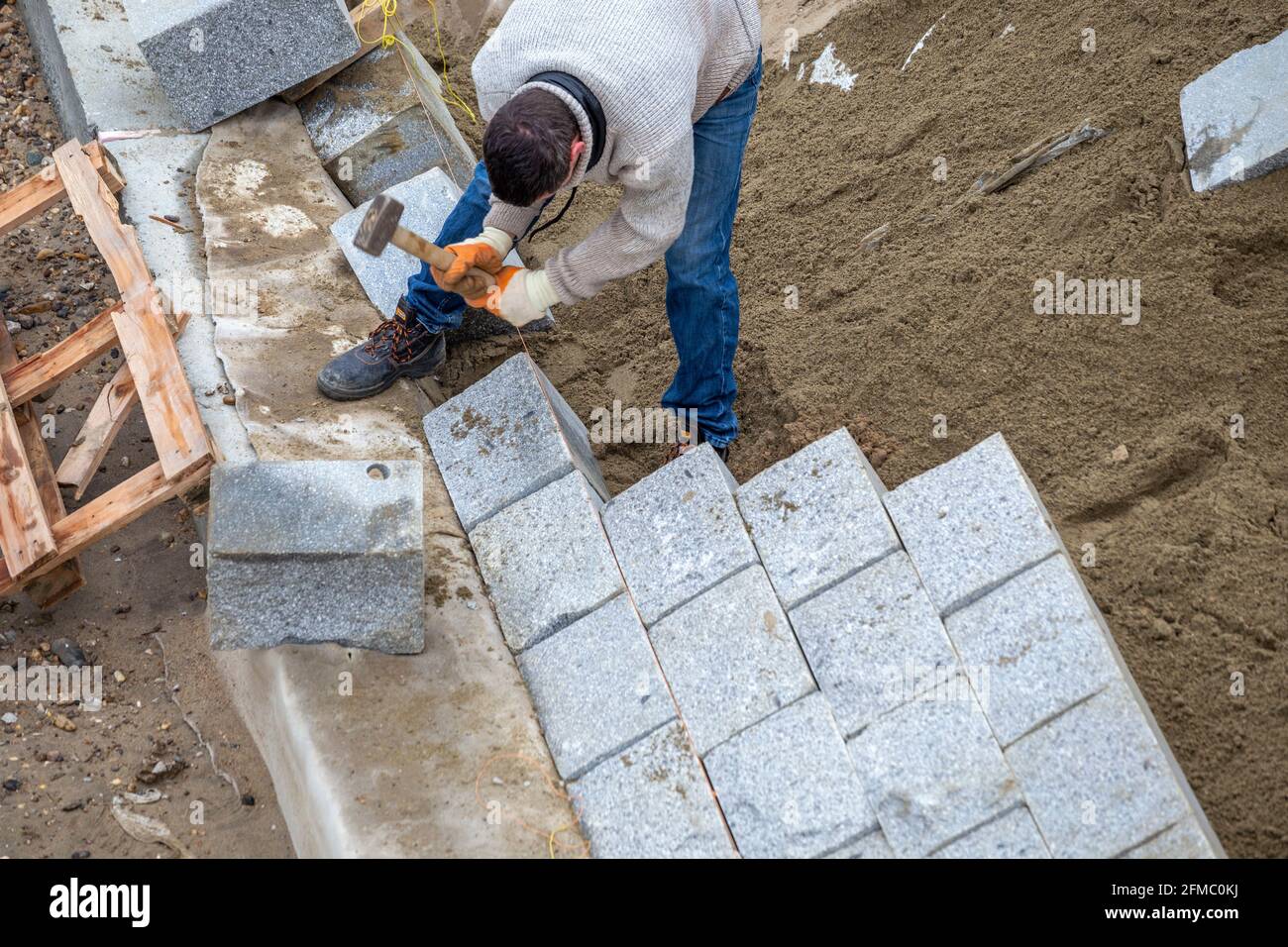Granite stone pavement at the bank of the river used to protect the ...