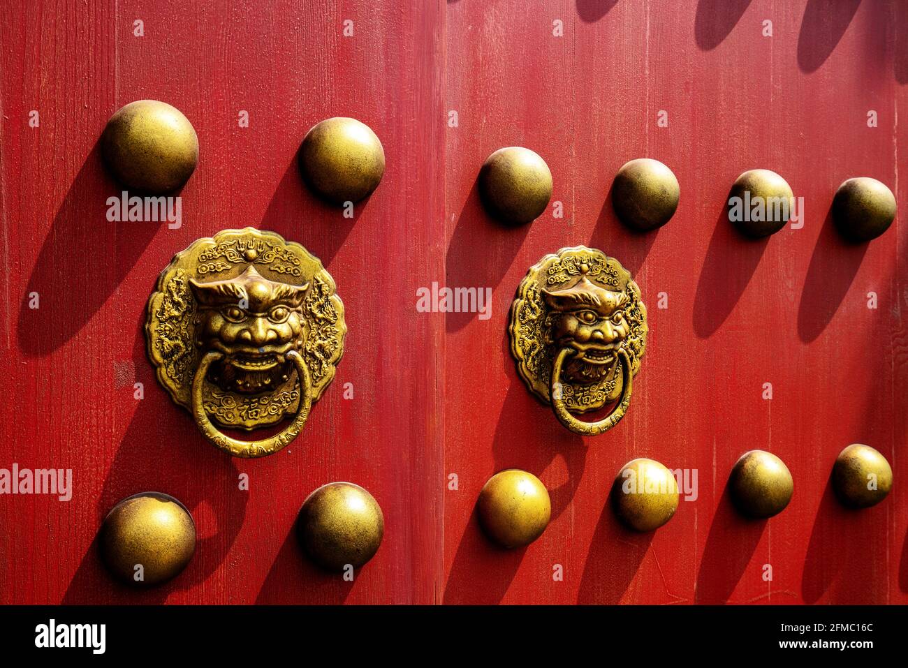 Red gates and historic buildings, Beijing, China Stock Photo - Alamy