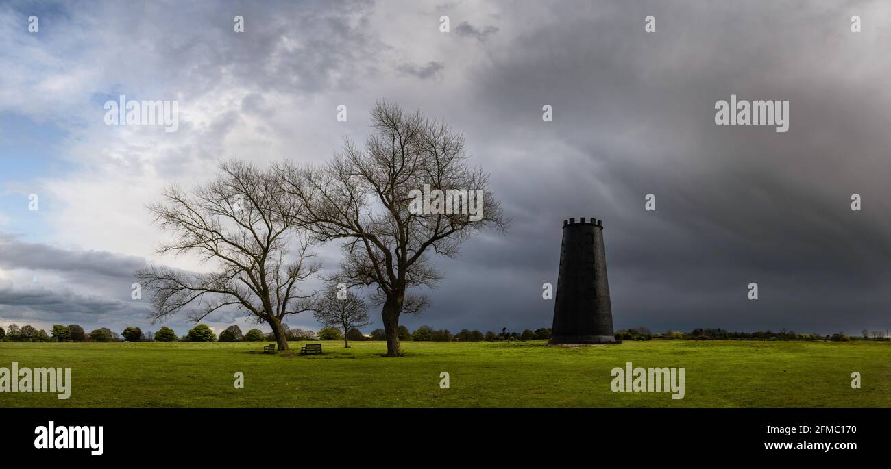 Black Mill, a local landmark, flanked by leafless trees at dawn on the ...