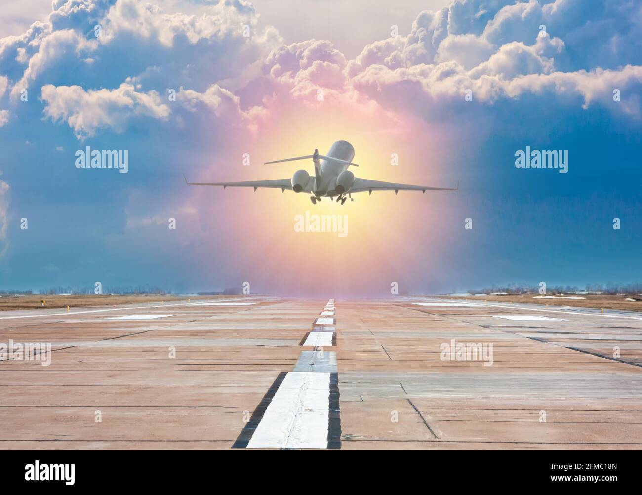 Corporate business jet take off from airport runway against the ...