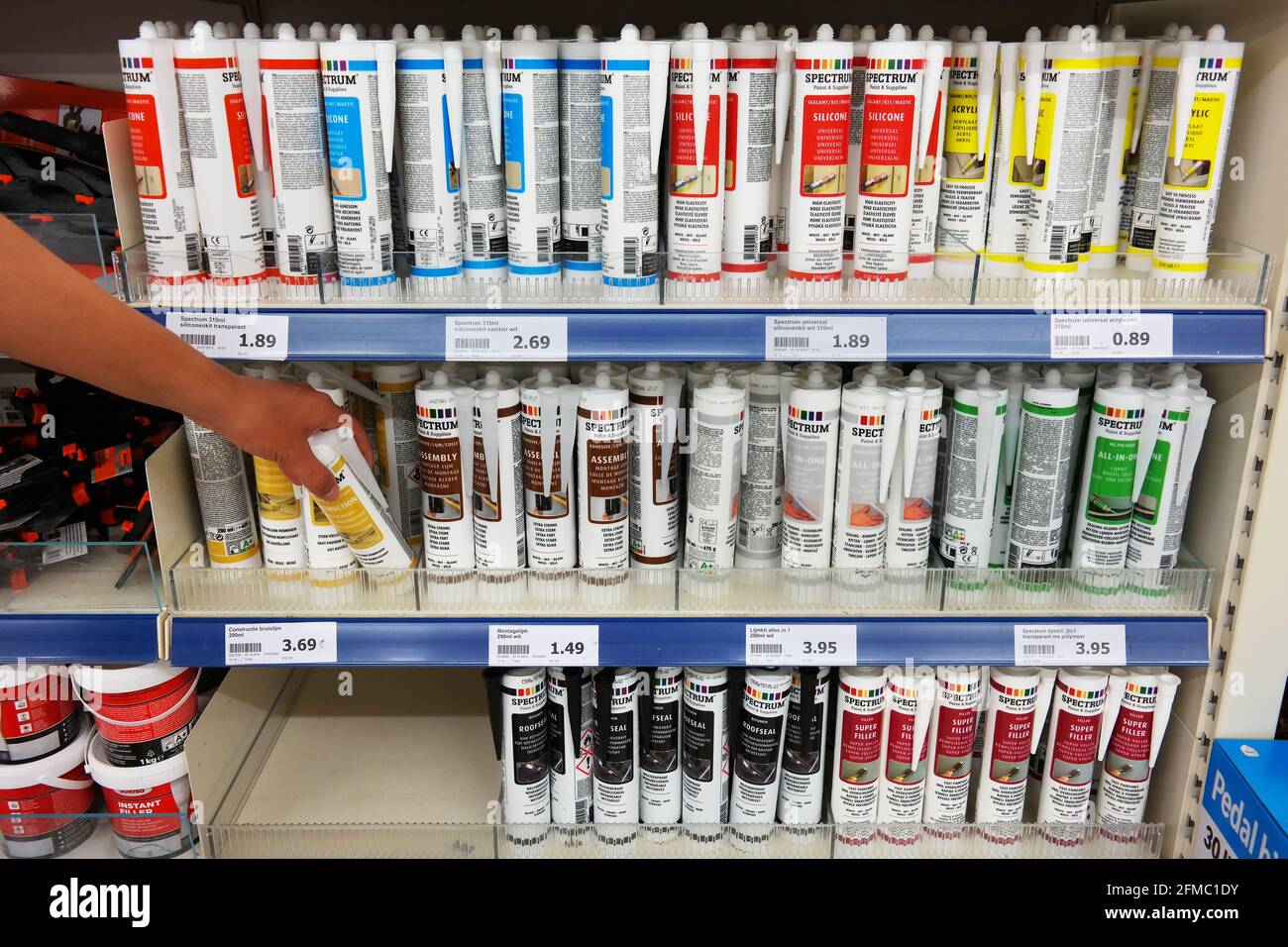 Assortment putty in a store Stock Photo - Alamy