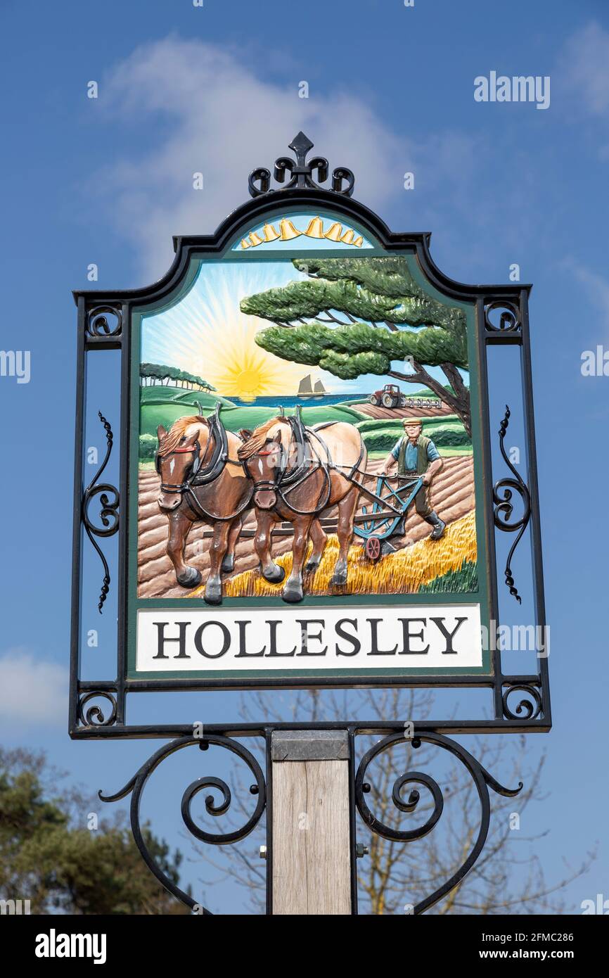 Village sign traditional and modern farming in coastal landscape ...