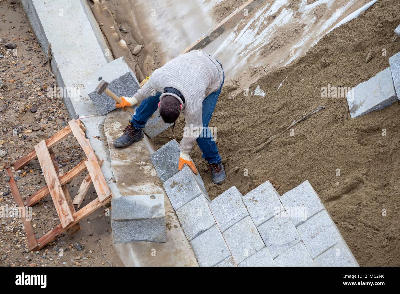 River bank granite stones installation to protect the bank from erosion ...