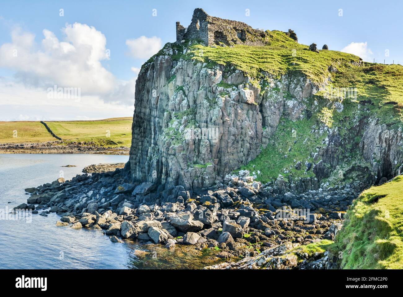 Basalt promontory with ruins of the Duntulm castle, on the north coast ...
