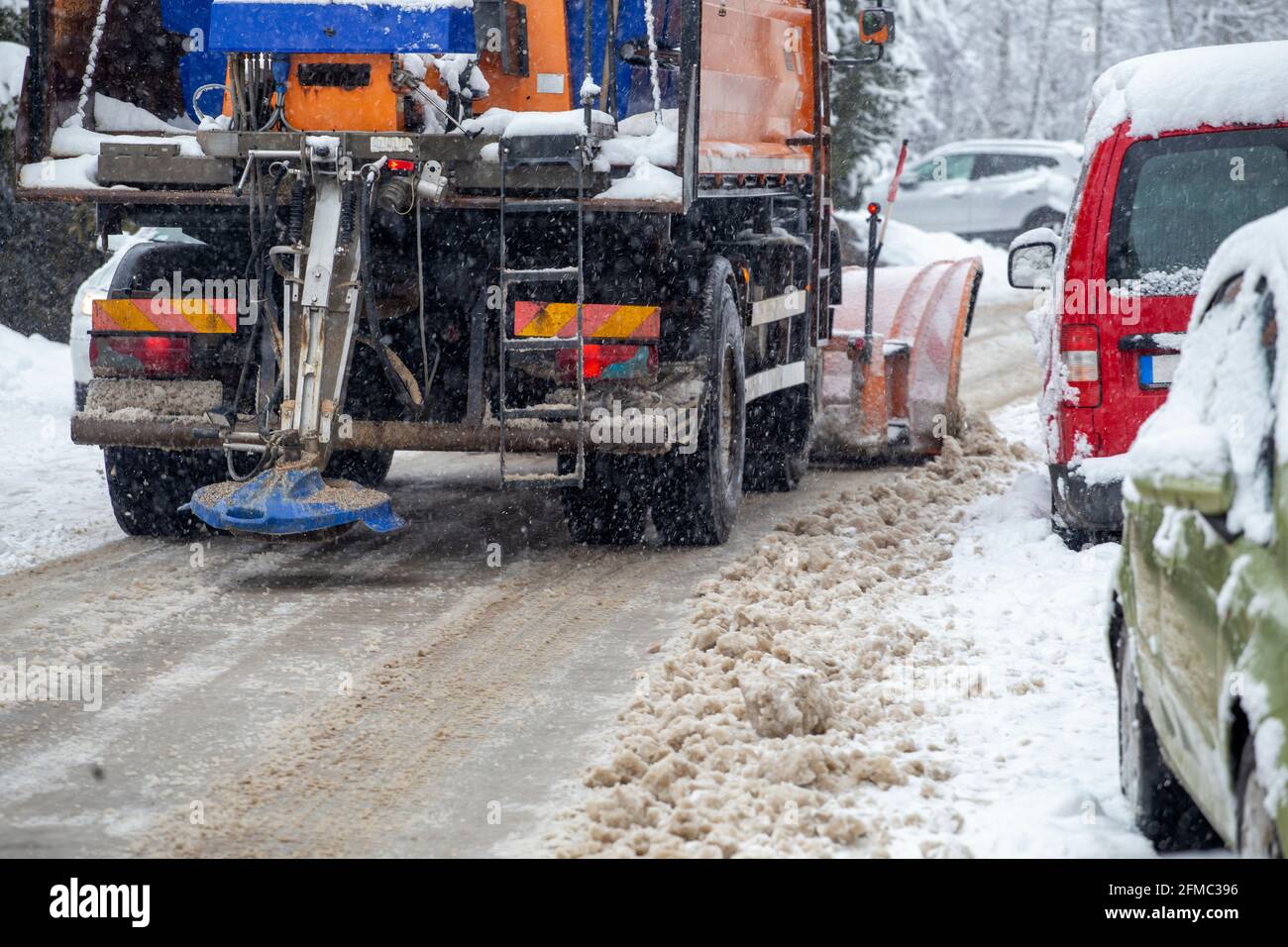 Winter snow removal concept. Snow plow trucks cleaning the snow from ...